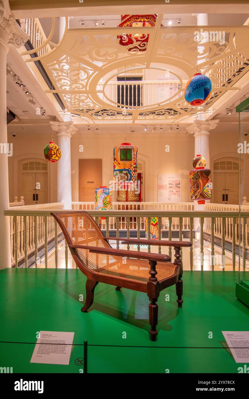 A reclining chair in the Peranakan Museum in Singapore, also called ...