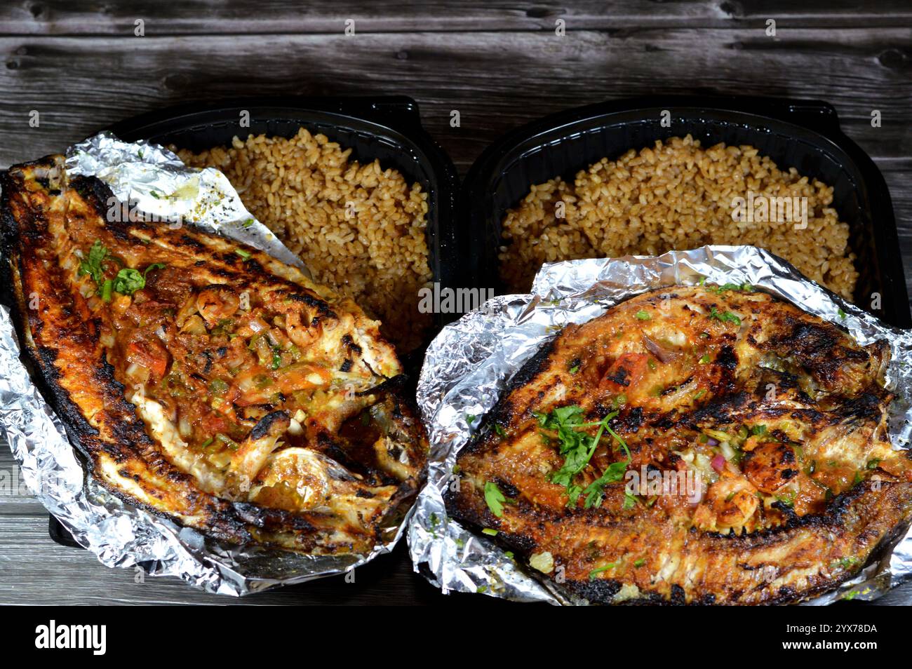 Tilapia, Mullet Sinjari Fishes, the fish is opened and grilled with oil ...