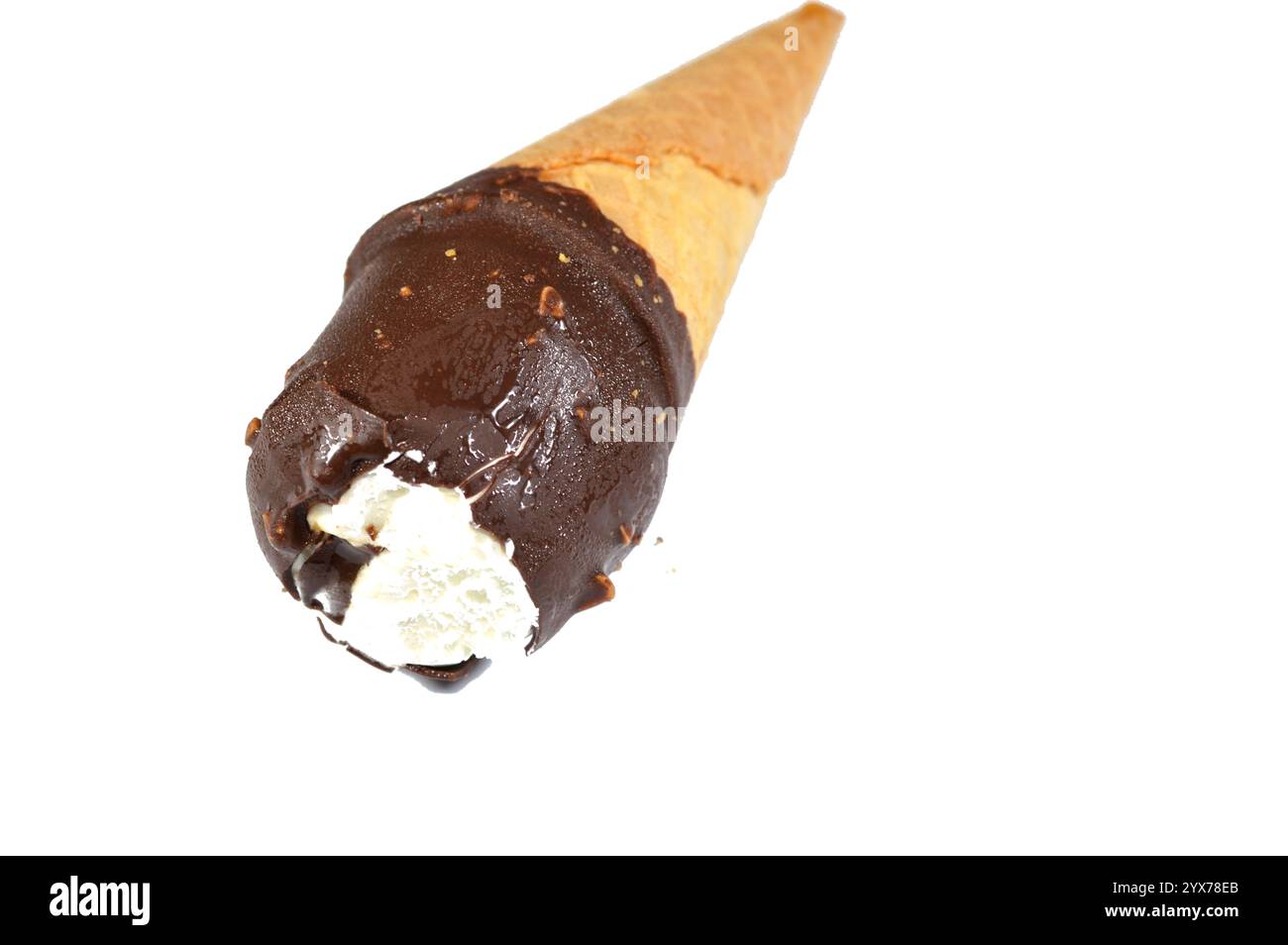 Ice cream vanilla cone coated with chocolate layer and nuts in a crispy ...