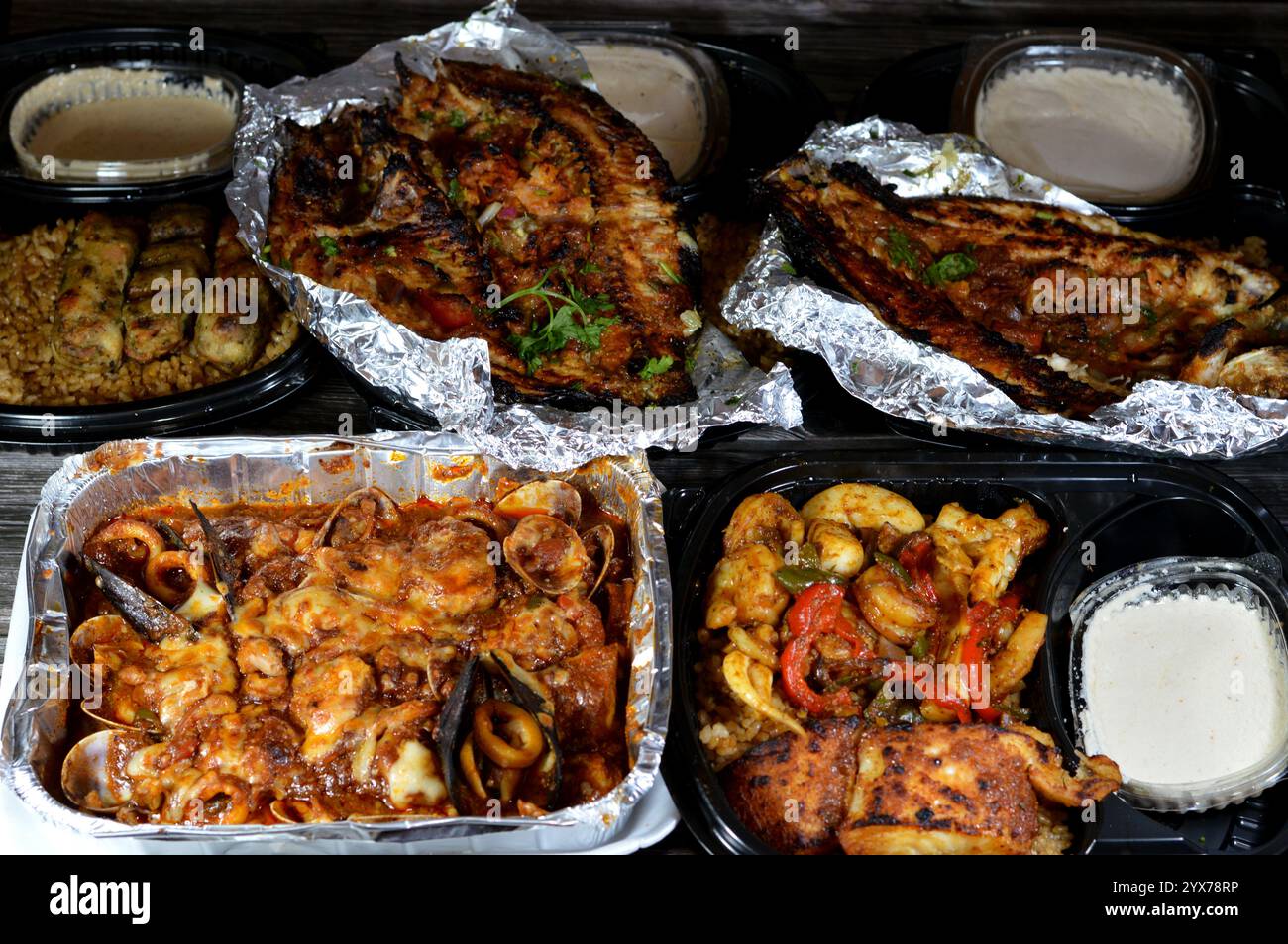 Seafood cuisine of Mixed fish fillet, shrimps, squid, squid eggs, fish ...