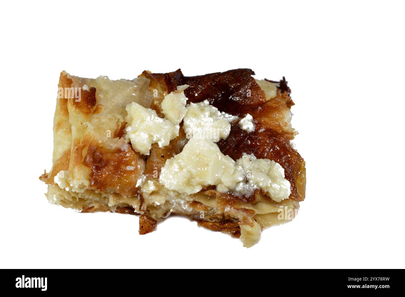 Creamy qeshta or fresh milk cream on a a cushioned pie or Feteer ...