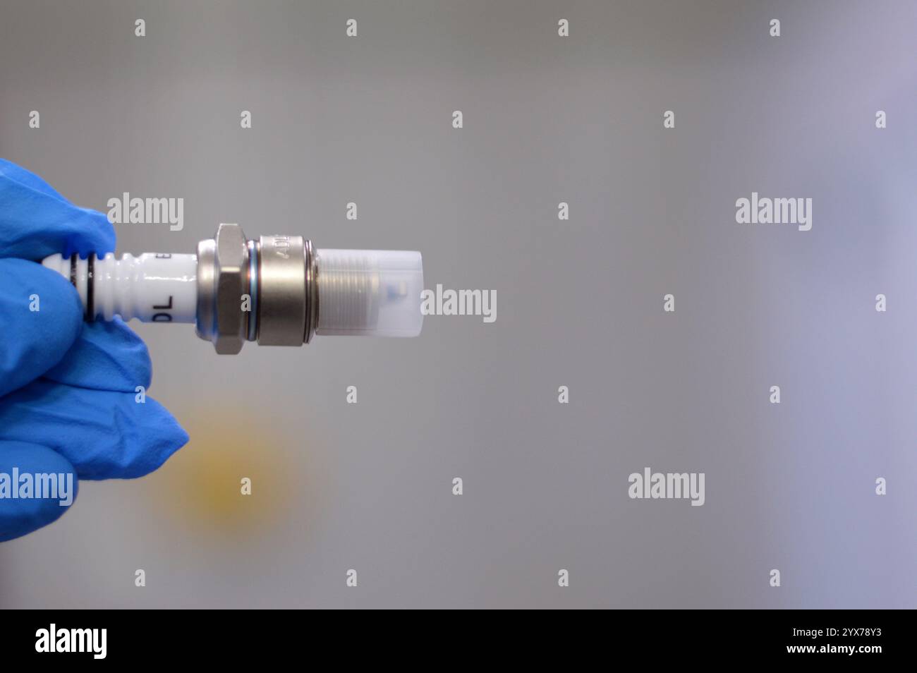 Cairo, Egypt, October 29 2024: New spark plug, a device that deliver ...