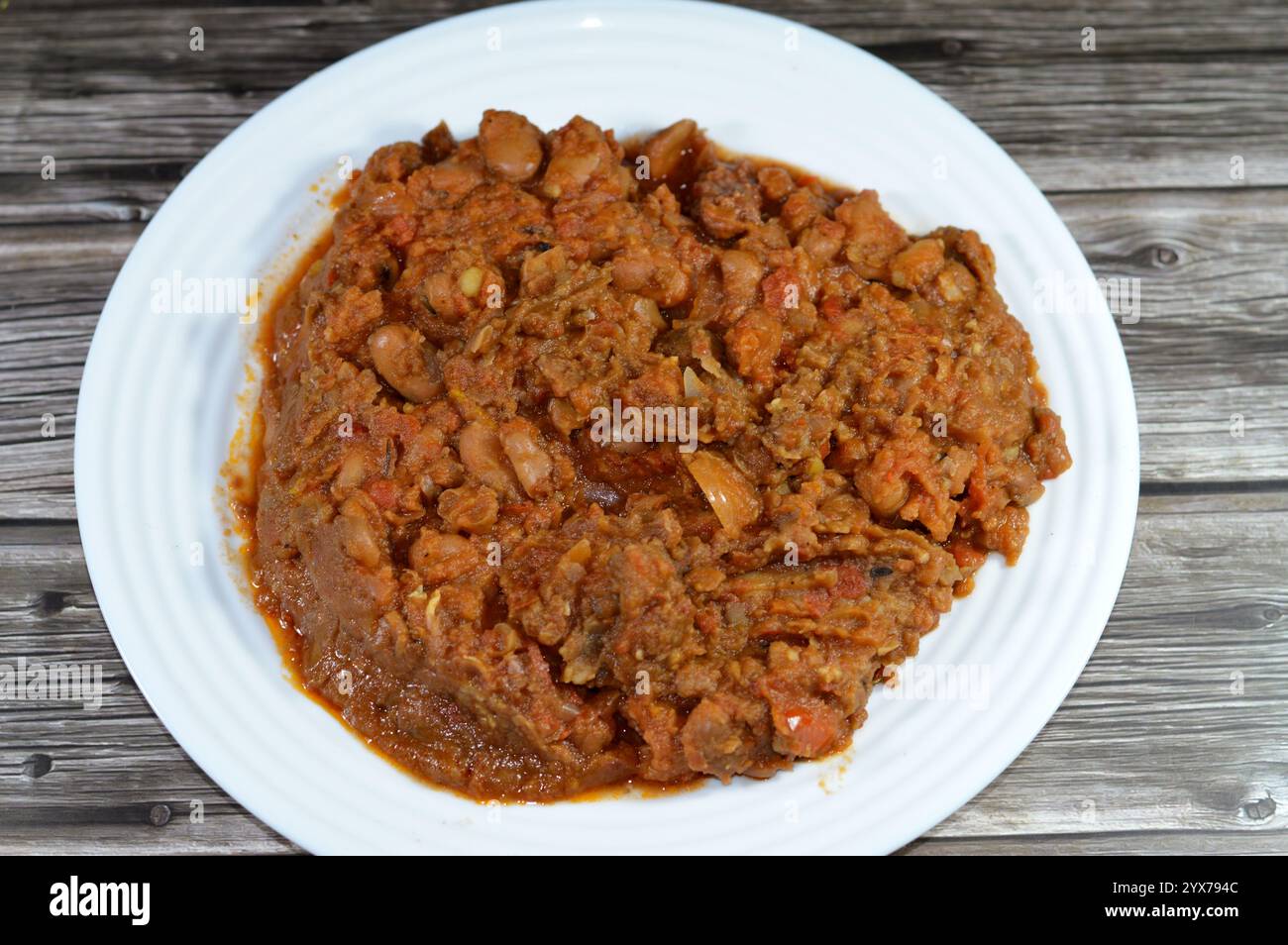 Egyptian fava beans with beef meat sausage, the main dish, sandwich in ...