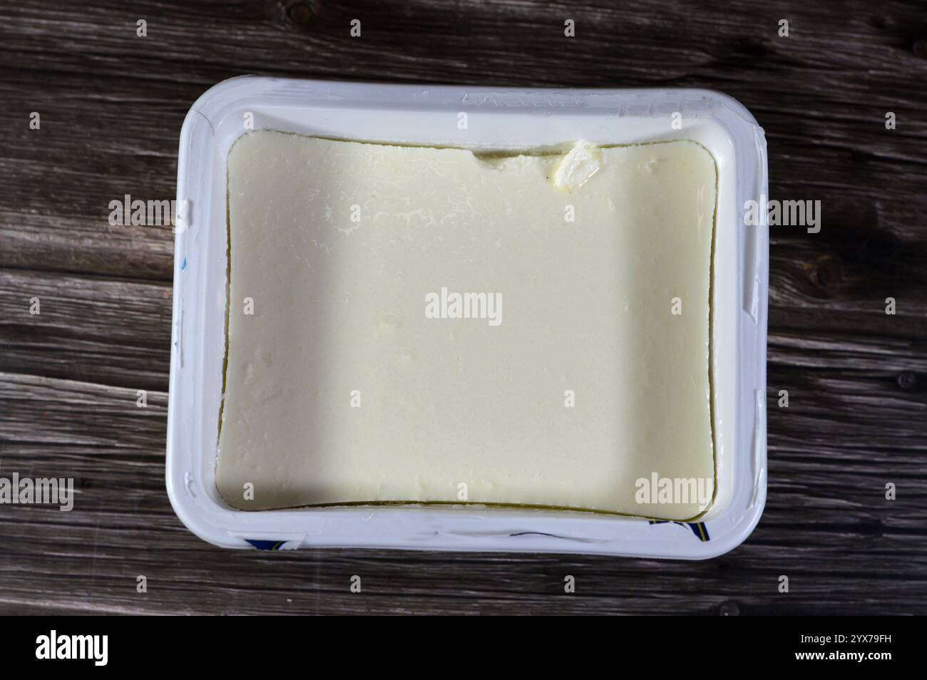 Feta, a Greek brined white cheese made from sheep milk or from a ...