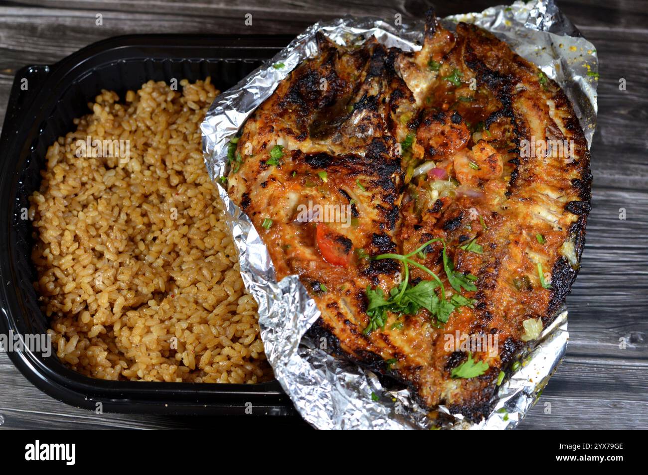 Steamed tilapia fish herbs in hi-res stock photography and images - Alamy