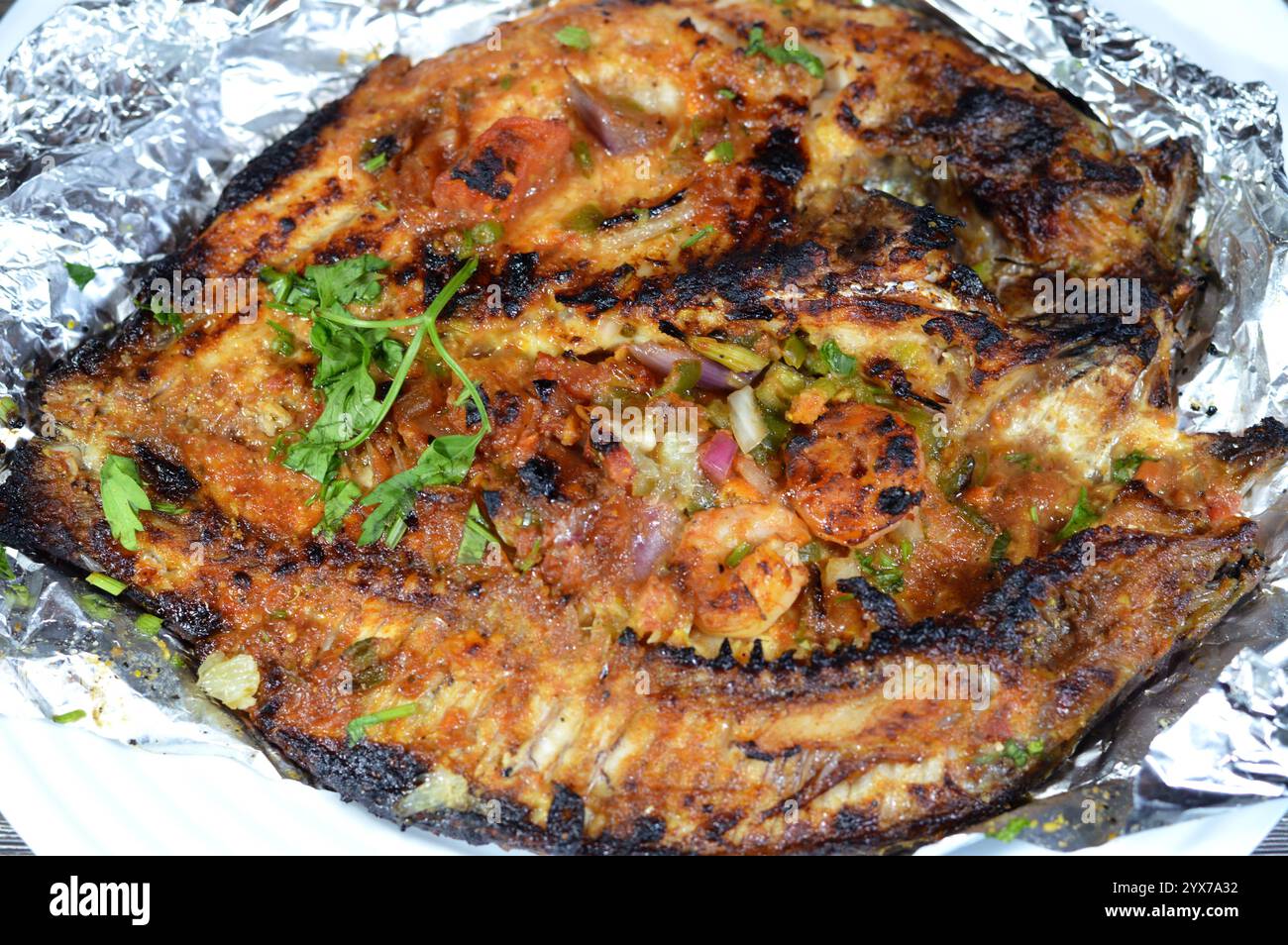 Steamed tilapia fish herbs in hi-res stock photography and images - Alamy