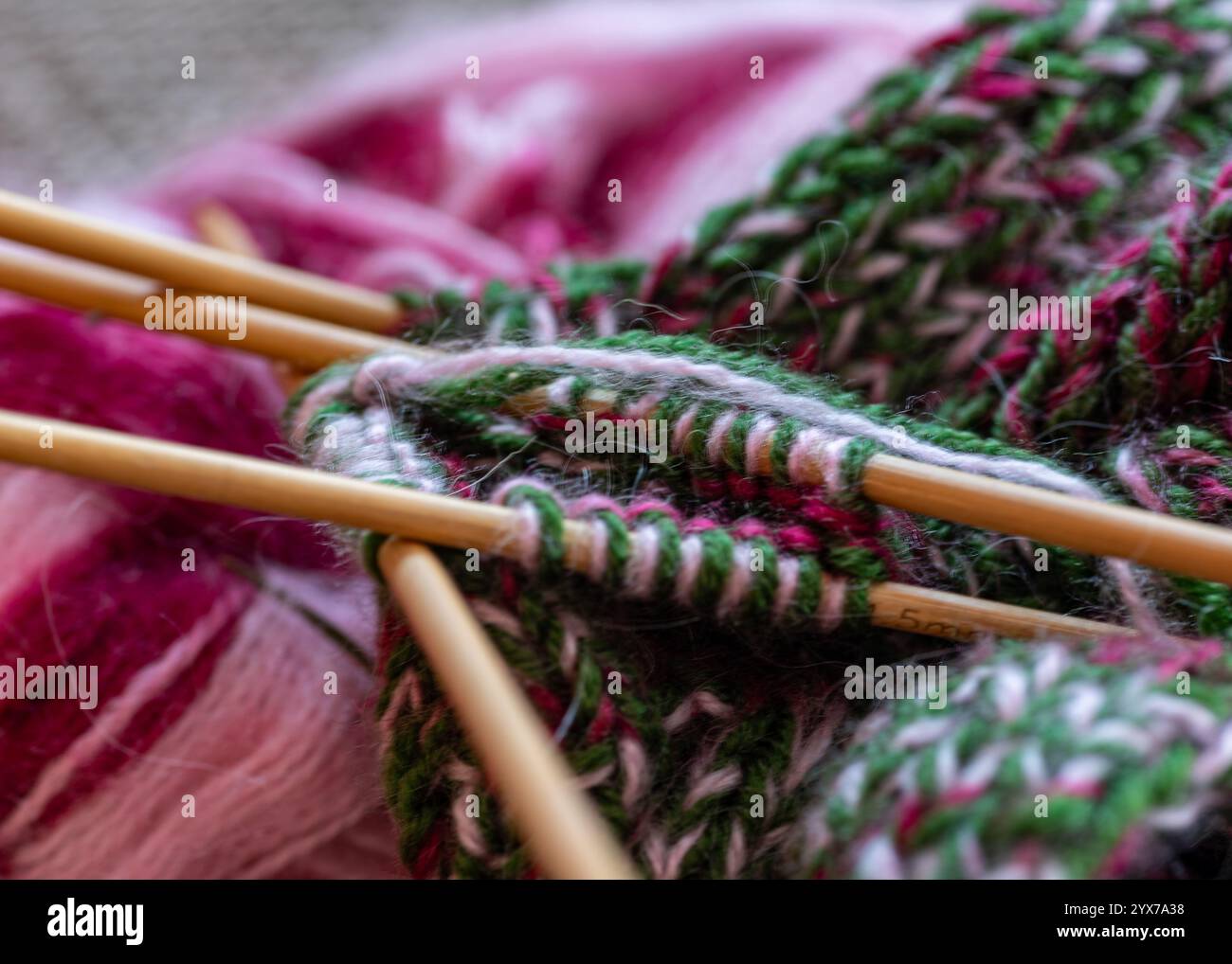 colorful knitted unfinished work, handicraft concept, knitting texture ...