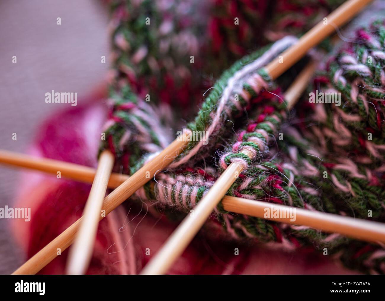 colorful knitted unfinished work, handicraft concept, knitting texture ...