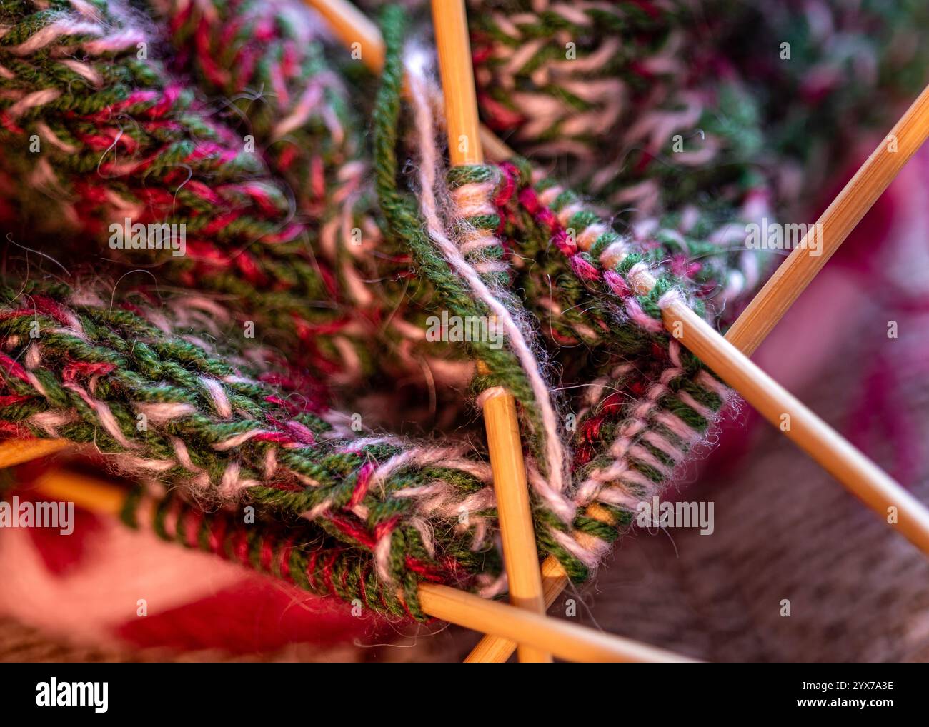 colorful knitted unfinished work, handicraft concept, knitting texture ...
