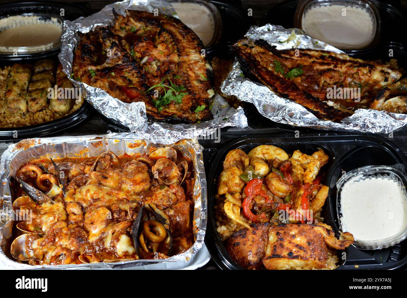 Seafood cuisine of Mixed fish fillet, shrimps, squid, squid eggs, fish ...