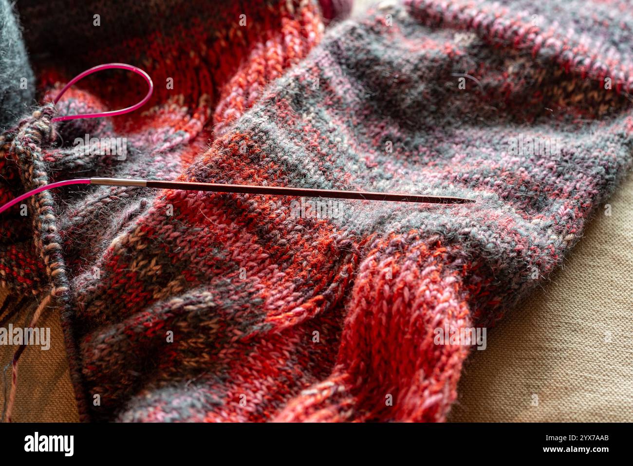 colorful knitted work in progress, handicraft concept, knit texture ...