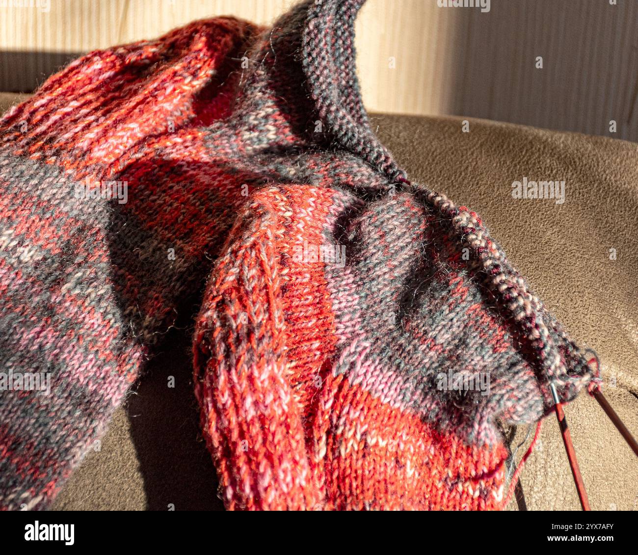 colorful knitted work in progress, handicraft concept, knit texture ...