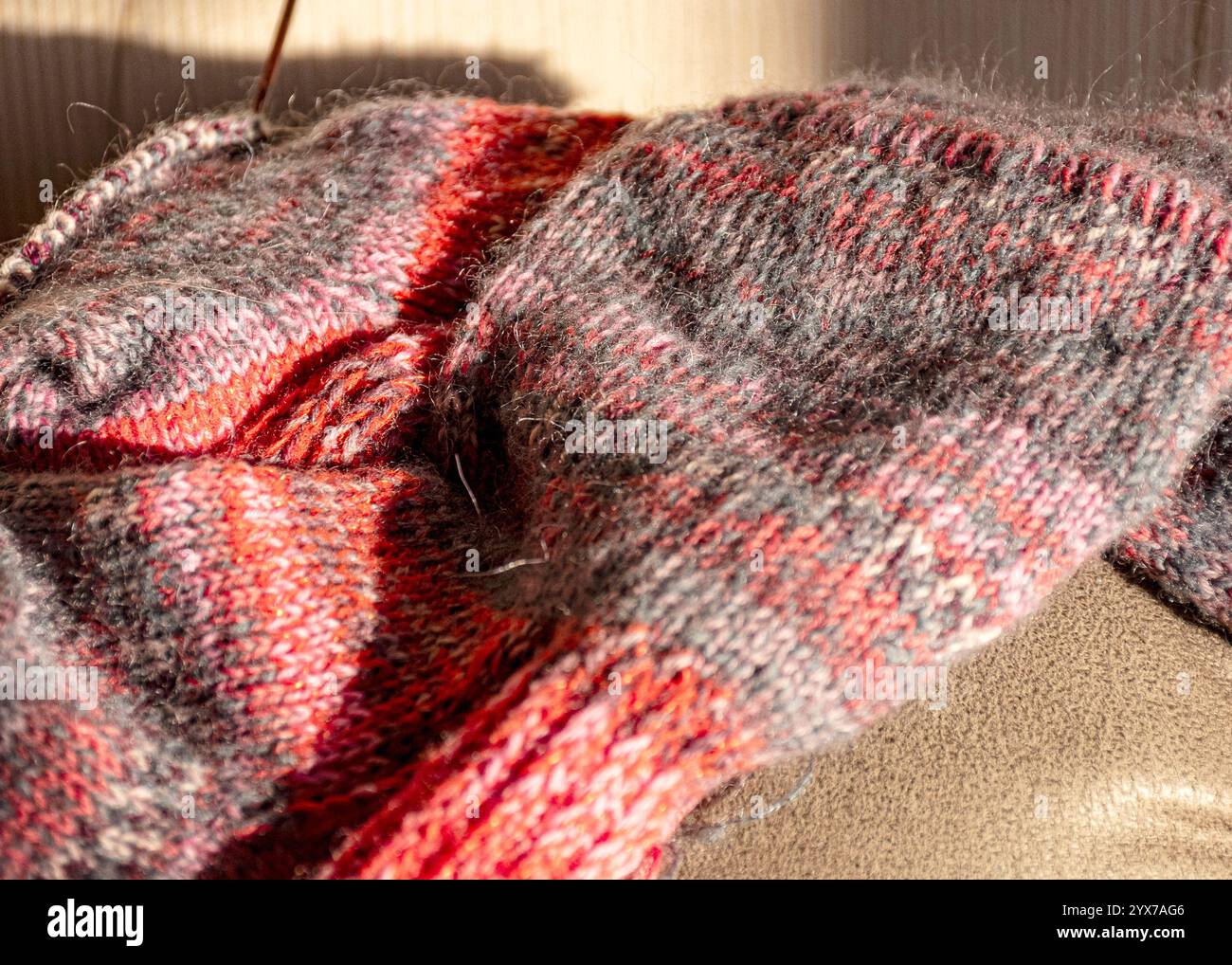 colorful knitted work in progress, handicraft concept, knit texture ...
