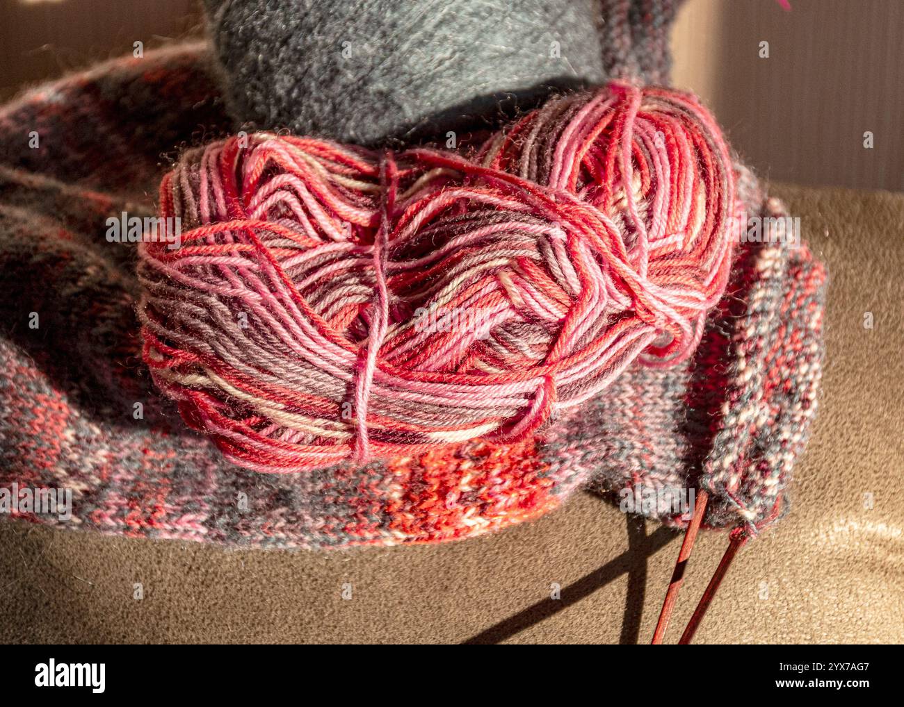 colorful knitted work in progress, handicraft concept, knit texture ...