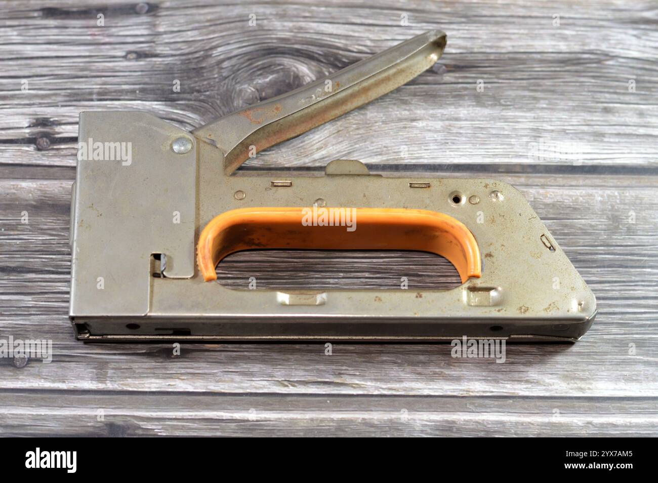 manual staple gun, powered stapler is a hand-held machine used to drive ...
