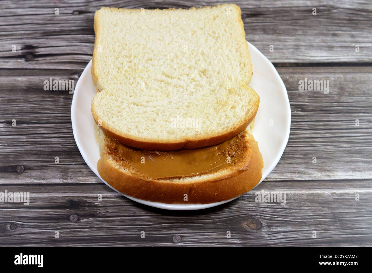 A normal toast bread with biscuits butter spread, caramelized biscuit ...