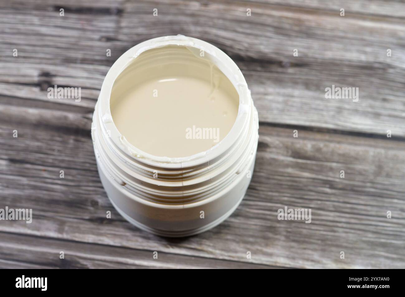 Fast white wood glue, an adhesive used to tightly bond pieces of wood ...