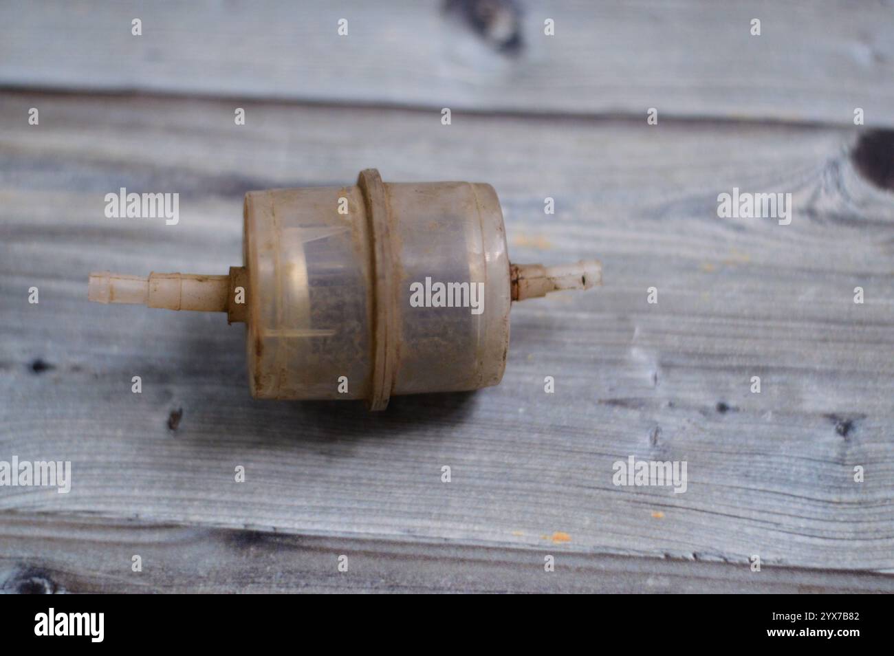 Old broken fuel filter for a car, a filter used to screen out foreign ...