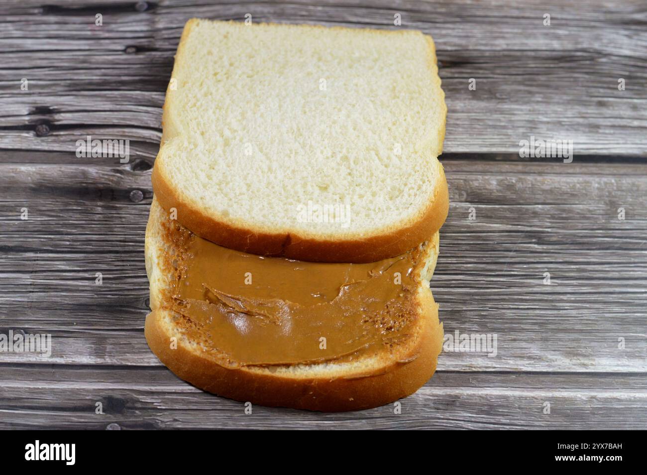 A normal toast bread with biscuits butter spread, caramelized biscuit ...