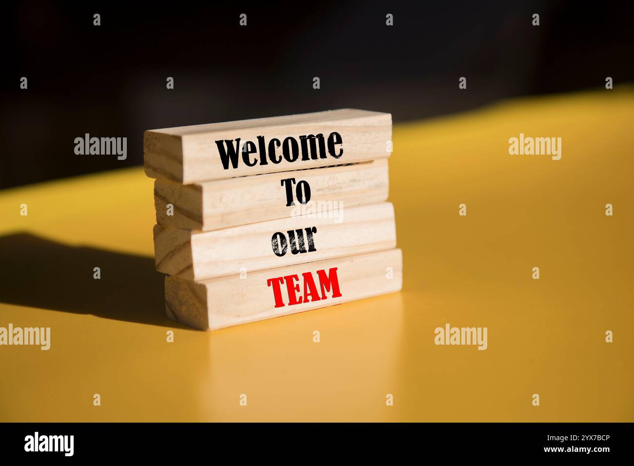 Welcome to our team symbol. Concept words Welcome to our team on wooden ...