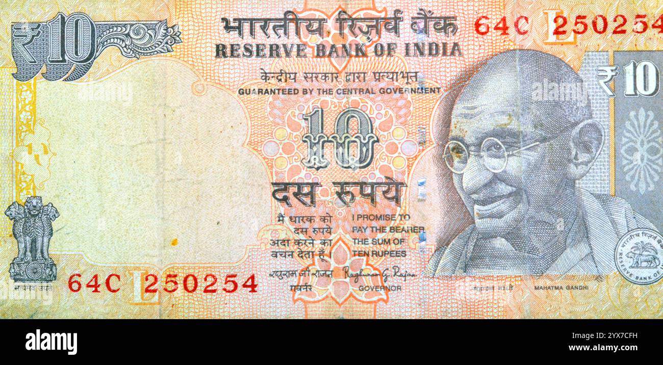 A large fragment of the obverse side of ten 10 Indian Rupees INR issued ...