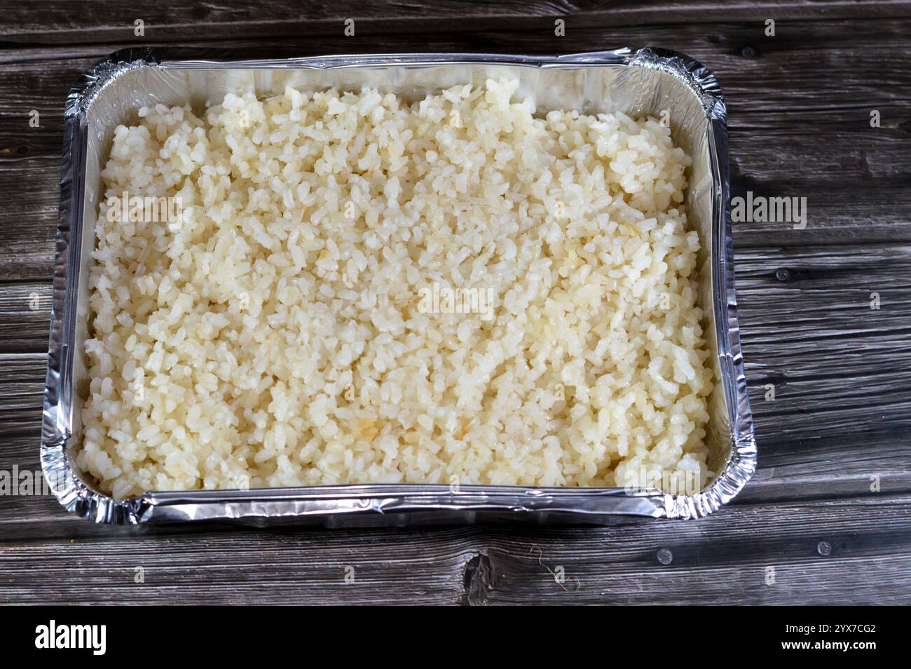 Egyptian white rice cooked on hot steam, grilled in oil or ghee then ...