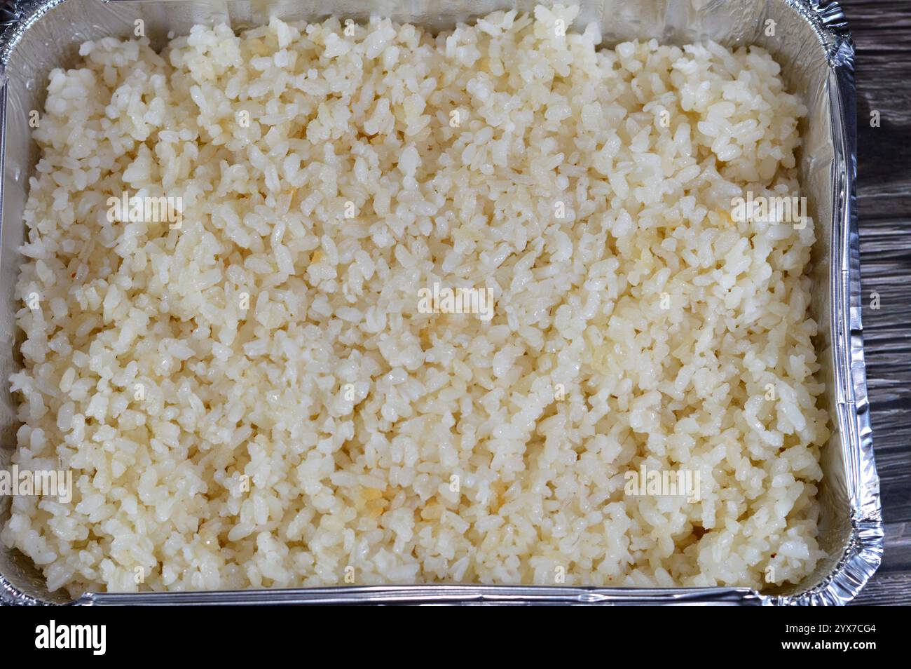 Egyptian white rice cooked on hot steam, grilled in oil or ghee then ...