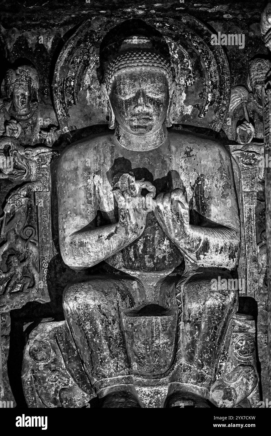 Relief carving of Buddha statue in preaching pose at Ajanta cave Stock ...