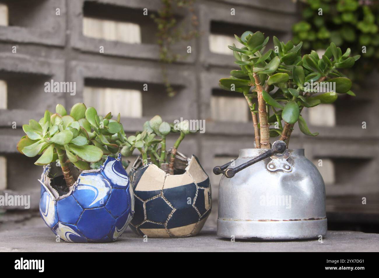 Reused planter ideas. old soccer ball and teapot turn into garden ...