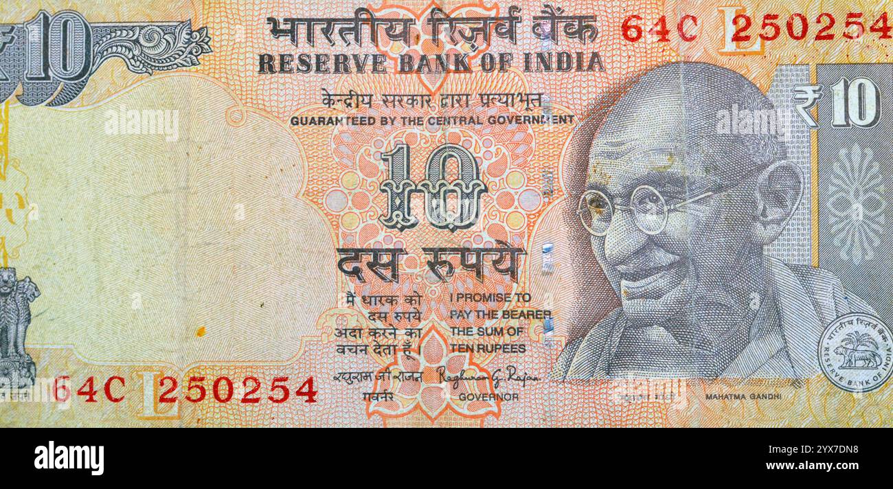 A large fragment of the obverse side of ten 10 Indian Rupees INR issued ...