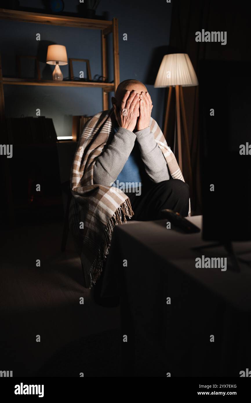 Senior elderly man at night, watching tv at home. Grandfather watching ...