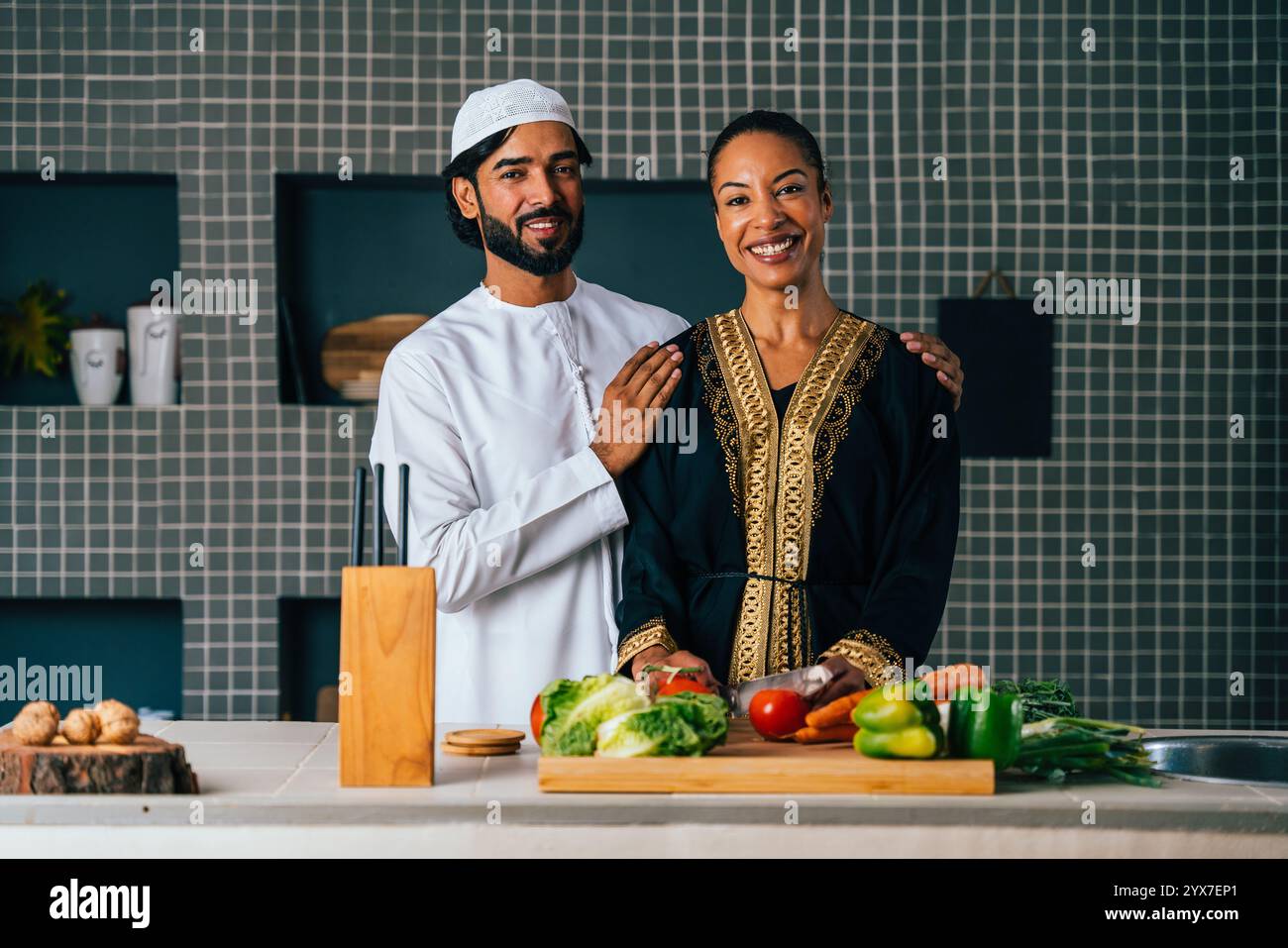 Happy beautiful young arab couple with emirati clothing together at ...