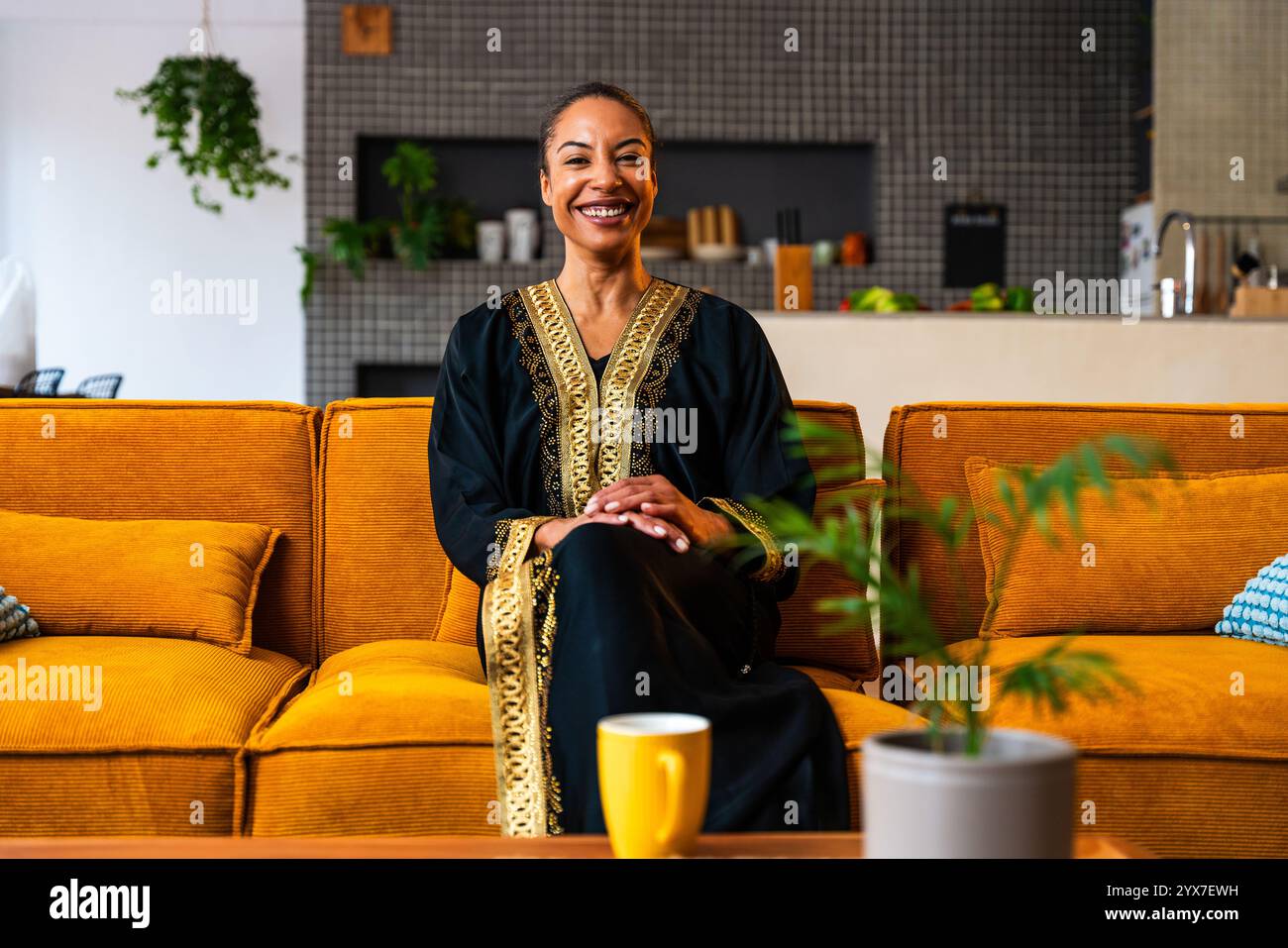 Happy beautiful young arab couple with emirati clothing together at ...