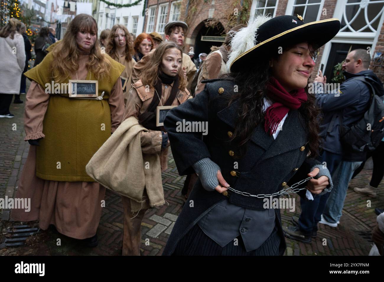 People in costumes from Charles Dickens' 19th-century English era take ...