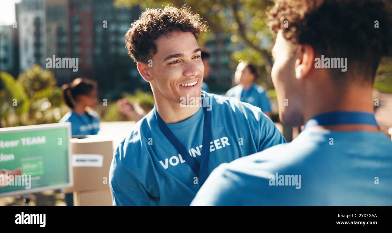 Teamwork, volunteer man and charity as friends for community service ...