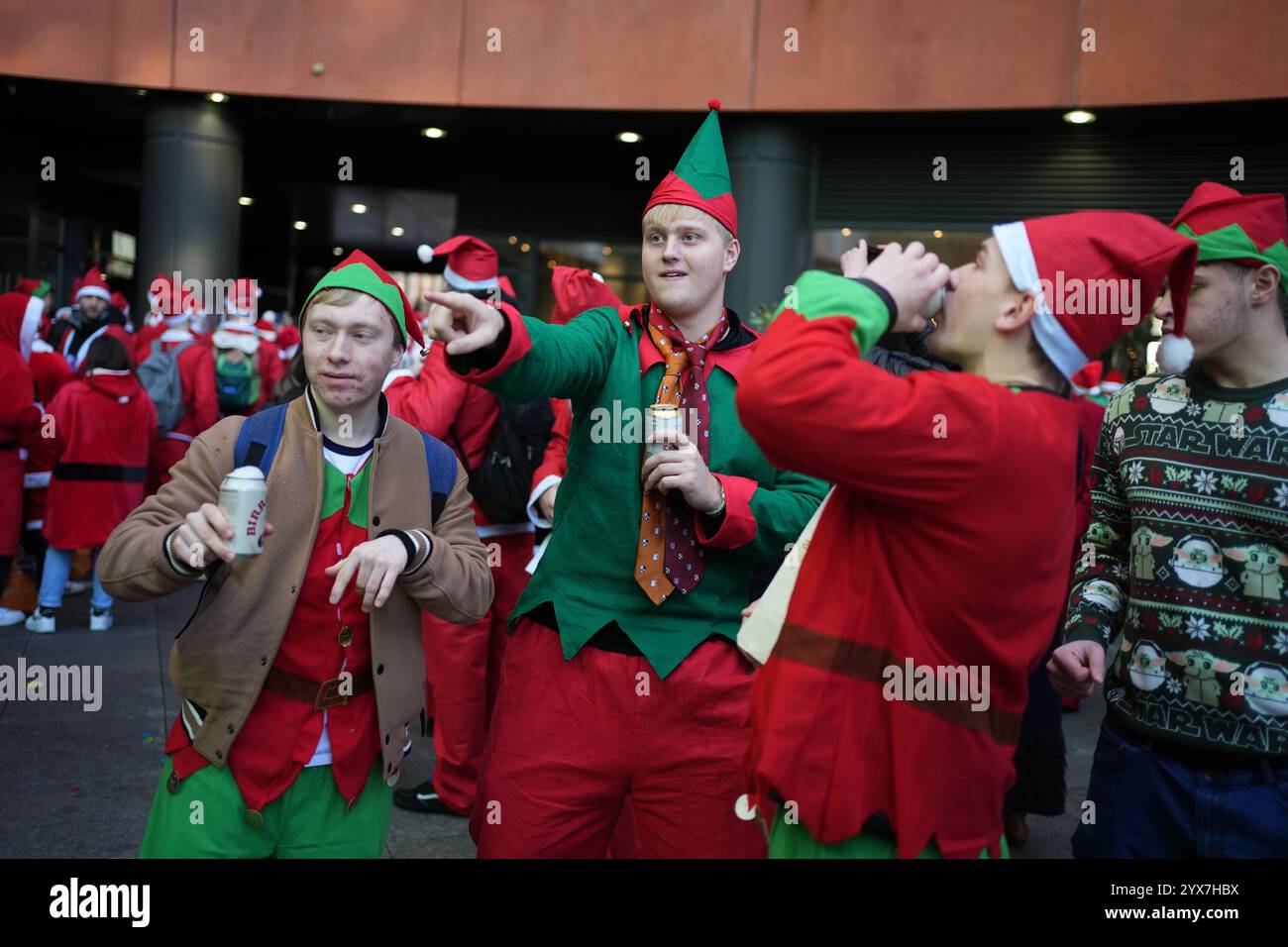People dressed as Santa take part in the London Santacon Christmas ...