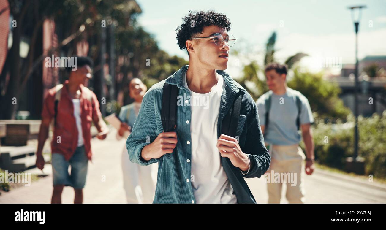 Education, man and walking with student friends outdoor together for ...