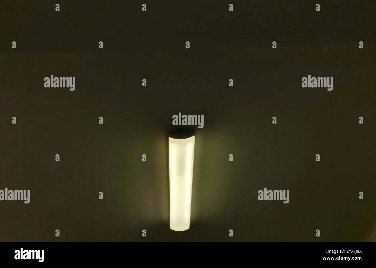 Neon Glow: Ceiling Light in Darkness Stock Photo - Alamy