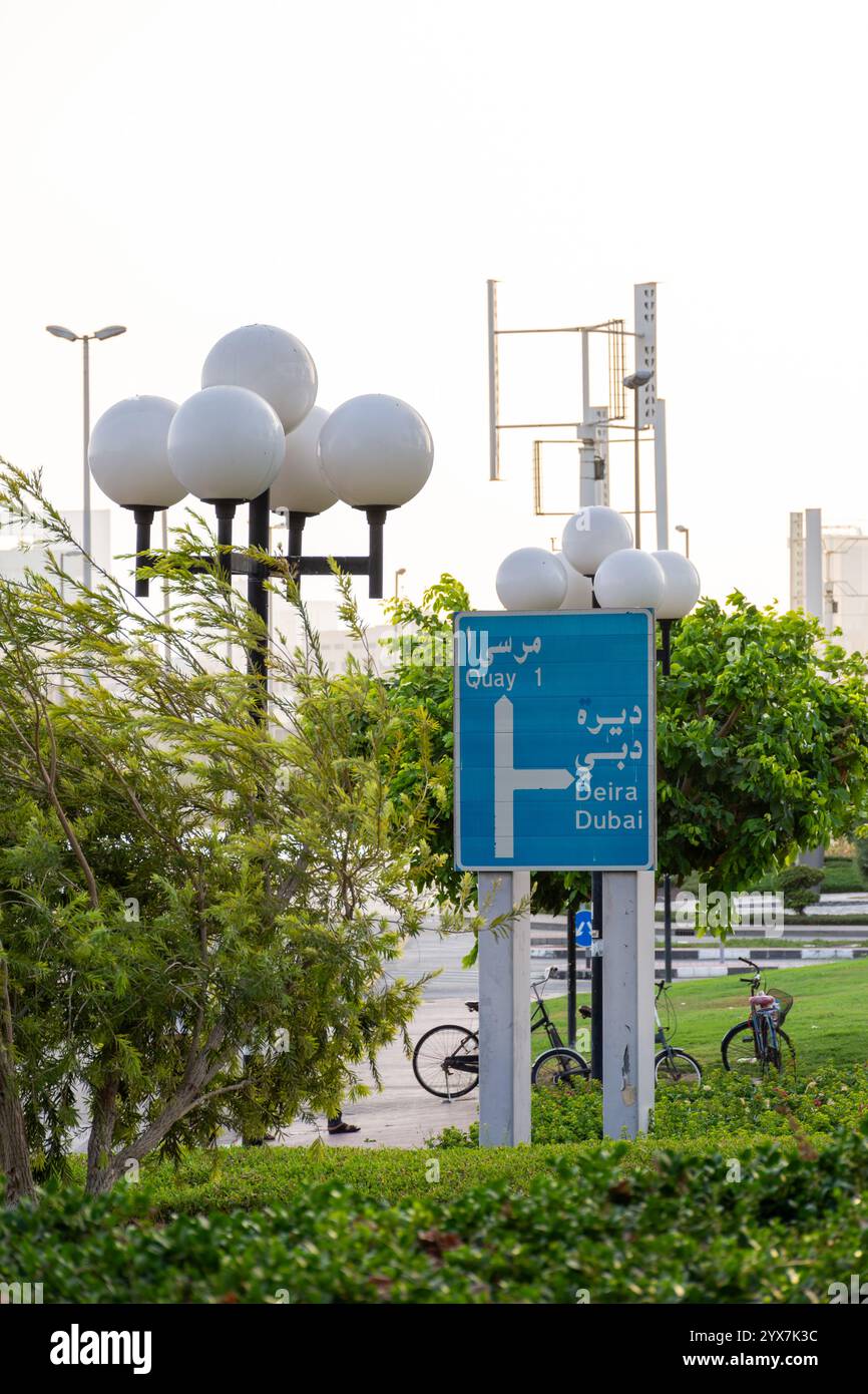 Directional road signs in Arabic and English in Riggat Al Buteen in ...