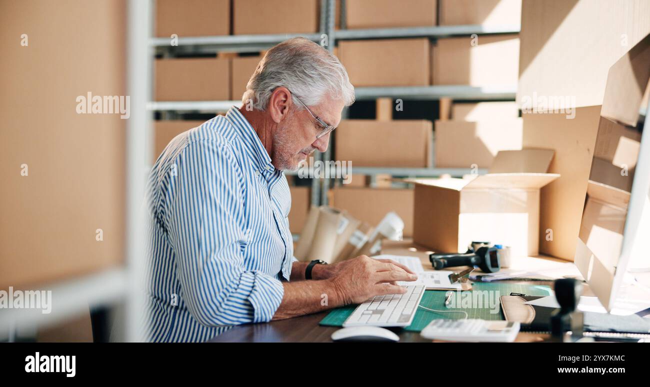 Senior man, typing and computer for distribution industry, inventory ...
