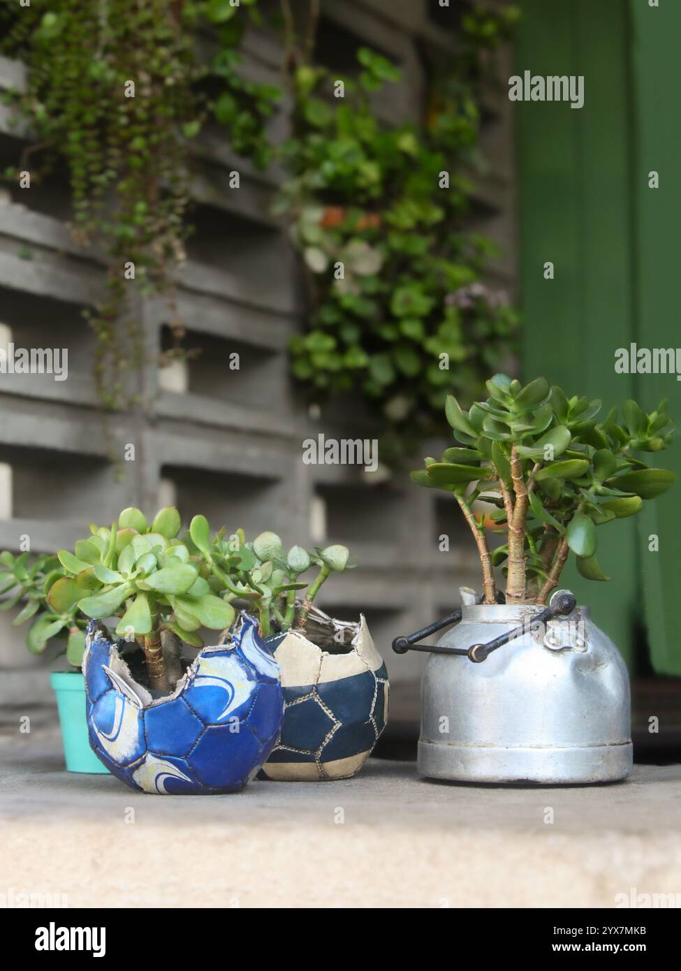 Reused planter ideas. old soccer ball and teapot turn into garden ...