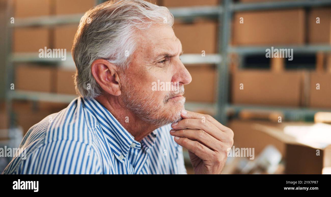 Thinking, logistics and mature businessman in office with cardboard ...