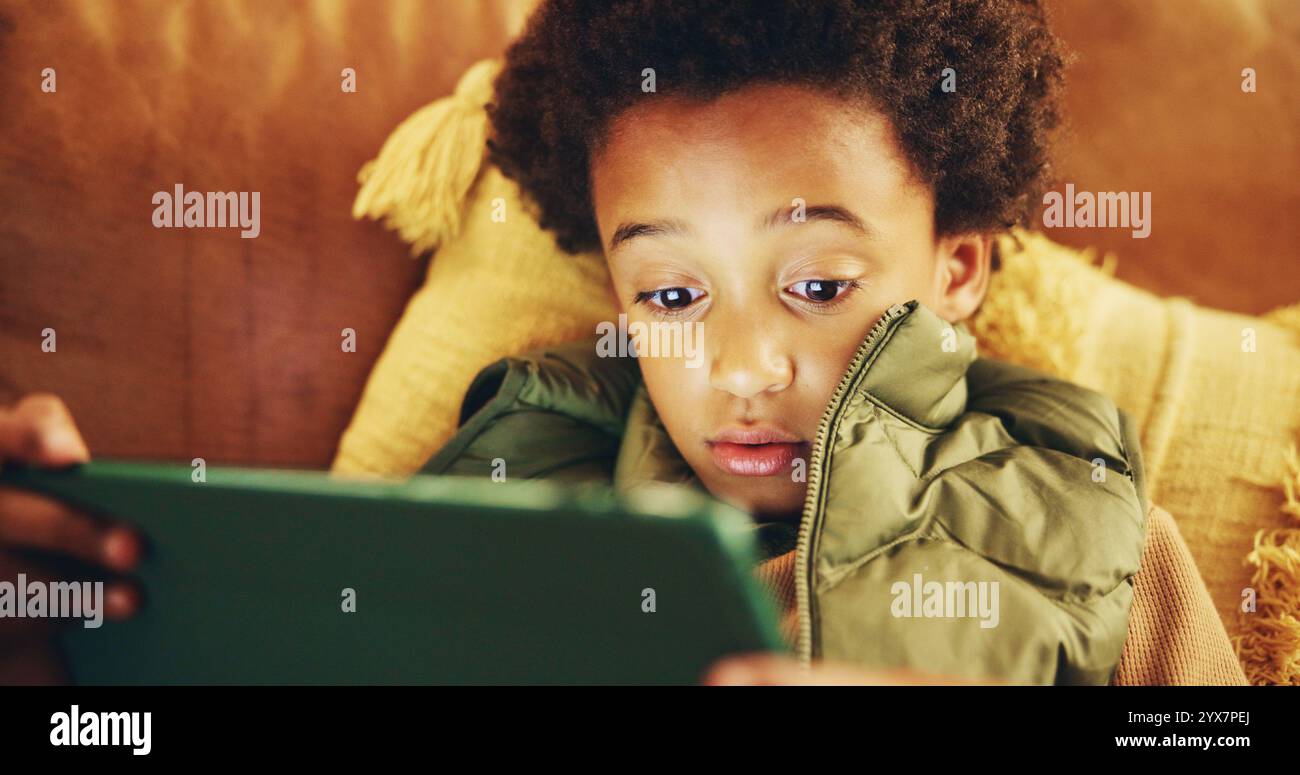 African child, streaming and tablet for relax, development and ...
