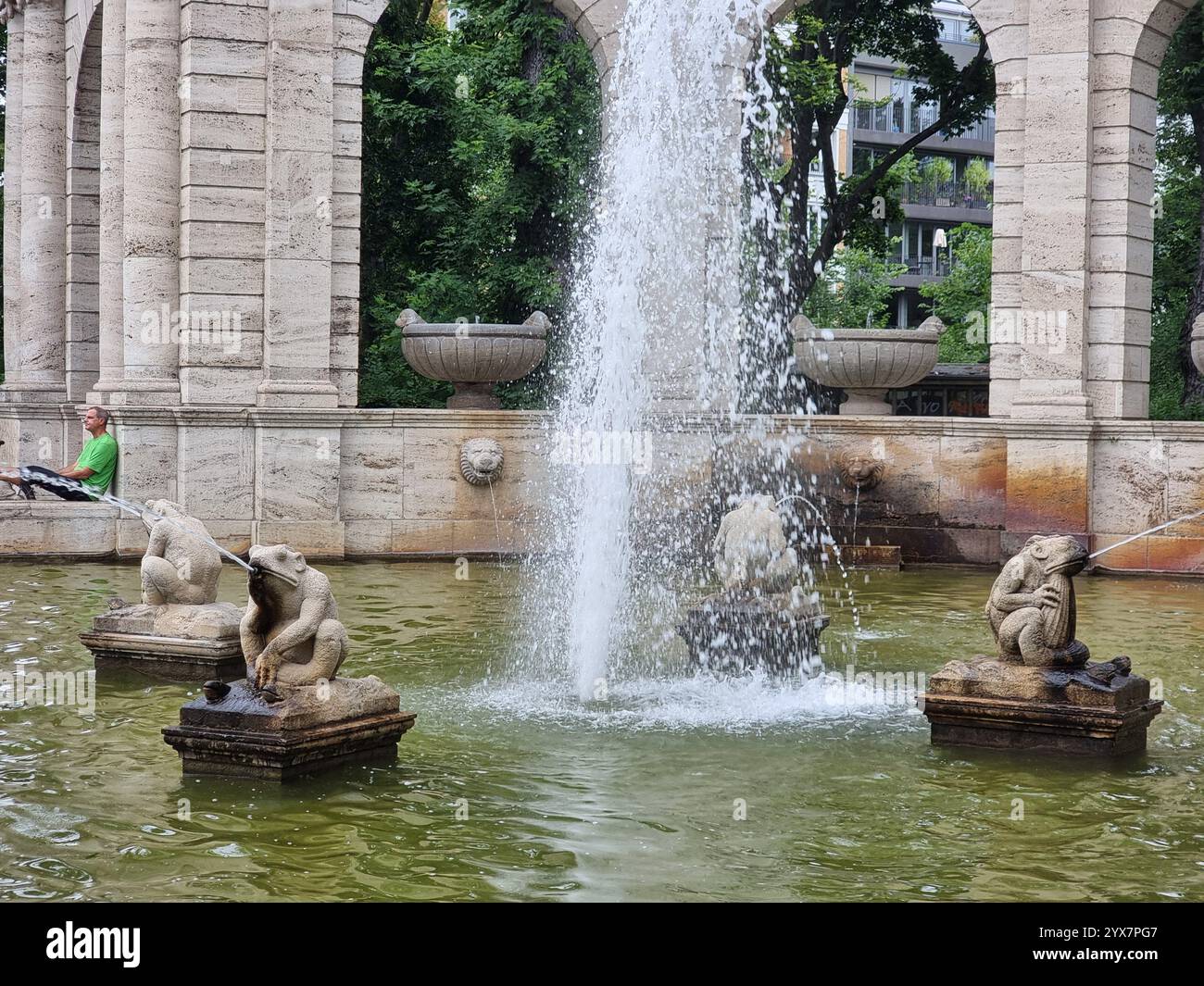 Frog stone sculptures of the Fairy Tale Fountain (Märchenbrunnen) in ...