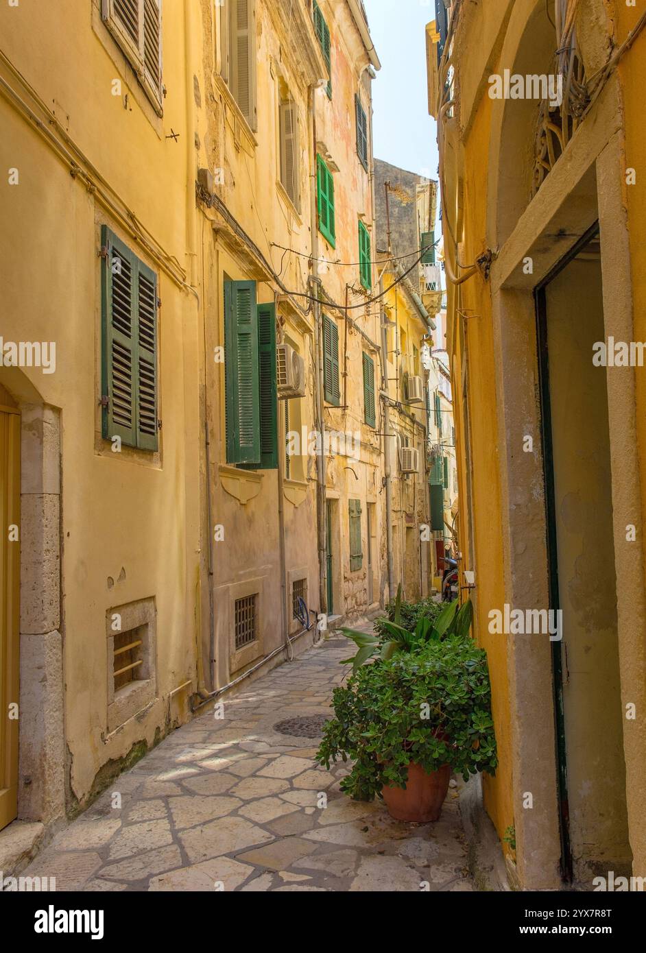 A quiet residential road in the historic centre of Corfu Old Town ...
