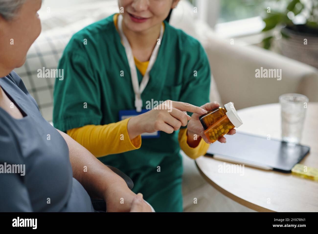 Doctor Prescribing Medicine To Senior Patient Stock Photo - Alamy