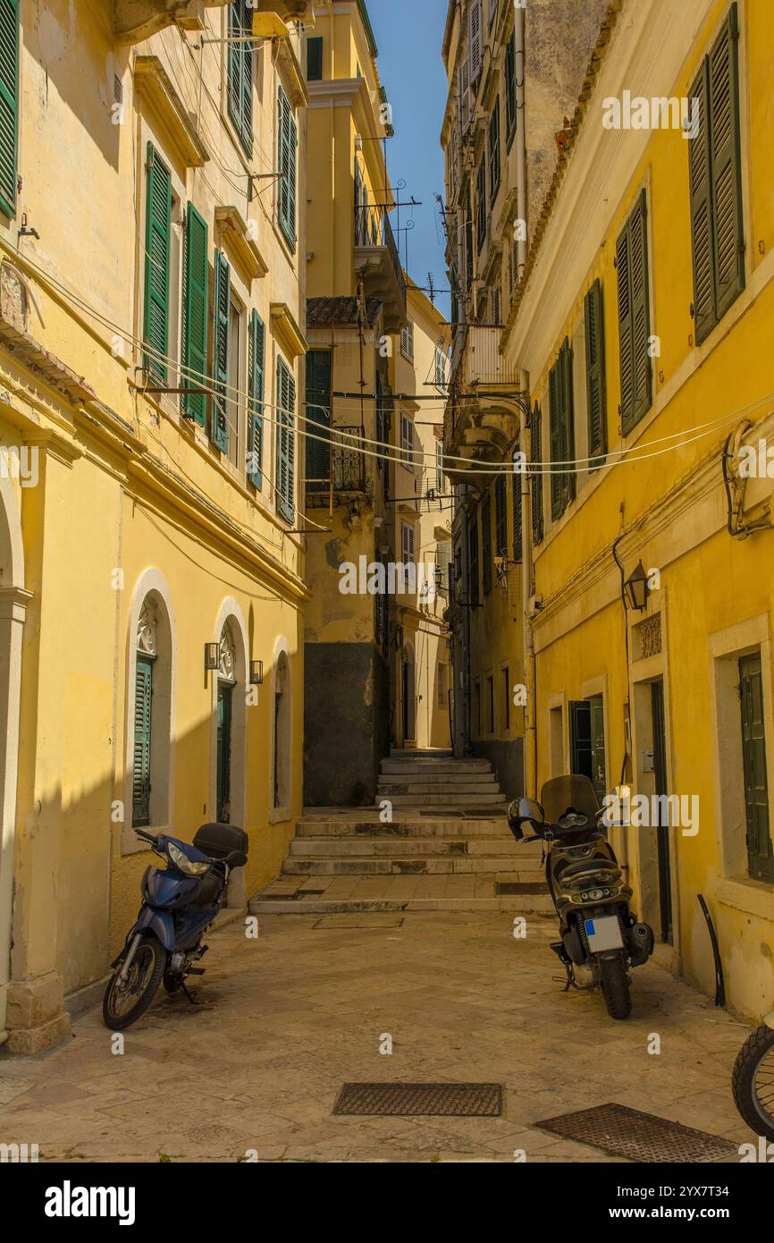A quiet residential road in the historic centre of Corfu Old Town ...