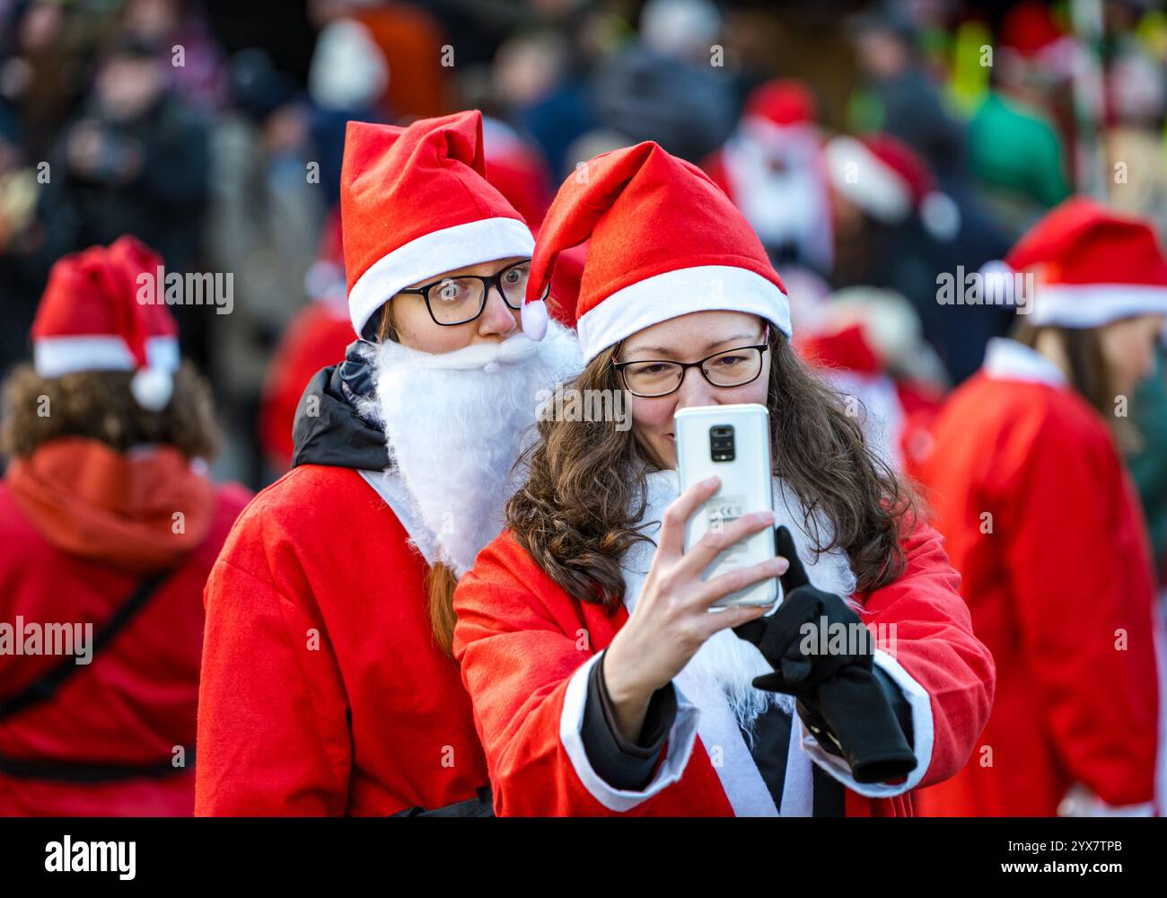 Young woman in santa costume hi-res stock photography and images - Alamy