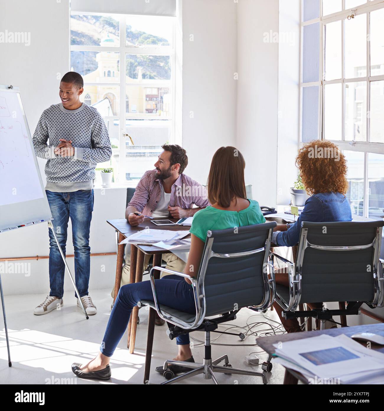 Man, whiteboard and speaker with meeting at startup for staff ...