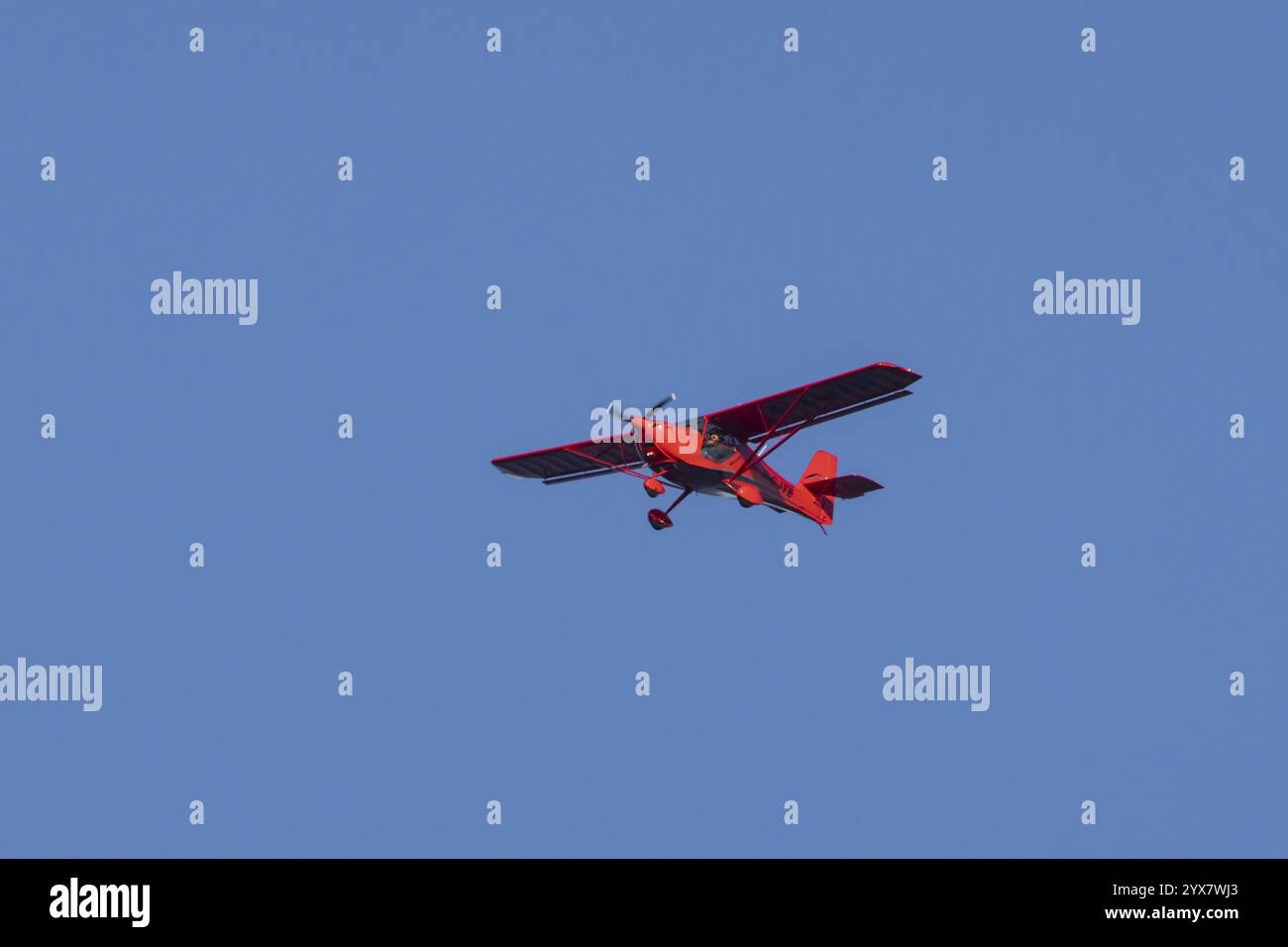 Aeropro Eurofox 3K aircraft flying in a blue sky, England, United ...